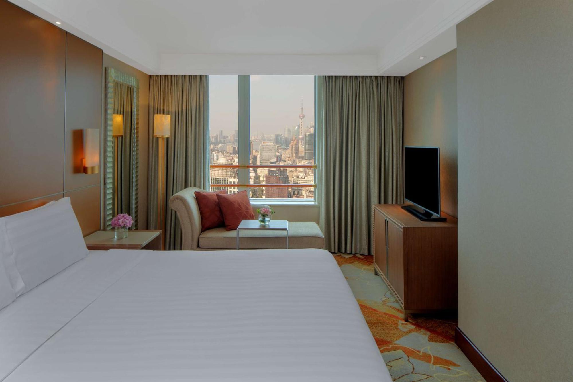 RADISSON BLU HOTEL SHANGHAI NEW WORLD ШАНХАЙ